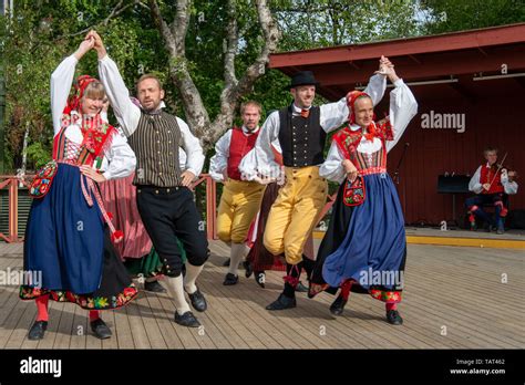 Swedish Performers In Traditional Dresses Sing And Dance At Skansen