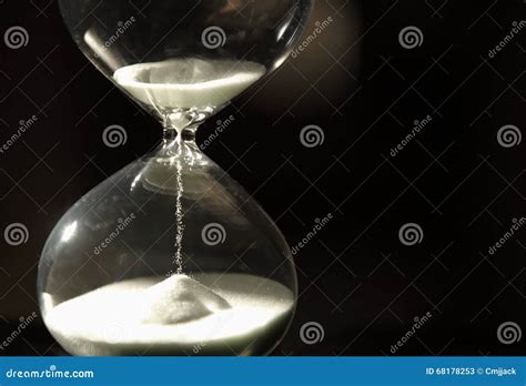 An Hourglass Measuring The Passing Time In A Countdown To A Deadline Stock Image Image Of