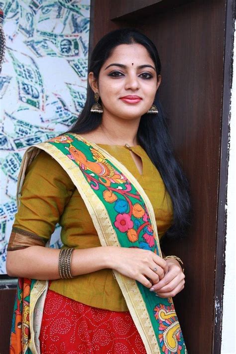 My Film And Its Stories Indian Actress Nikhila Vimal Hot Stills In Yellow Dress