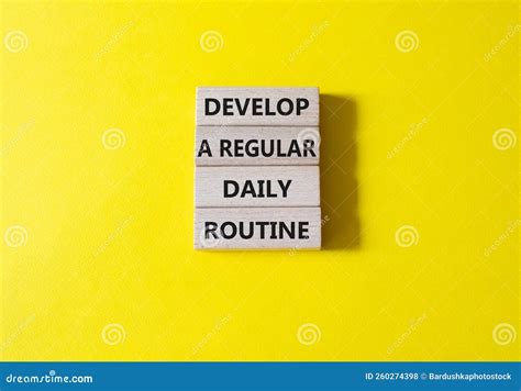 Develop A Regular Daily Routine Symbol Concept Words Develop A Regular Daily Routine On Wooden