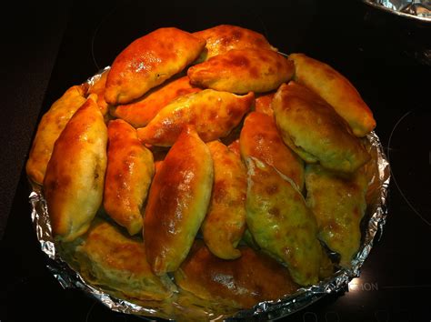 Piroshki ( Russian: пирожок, пирожки) Baked or fried buns stuffed with ...