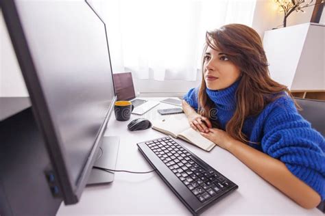 Female Software Developer Taking Lunch Break While Working Remotely