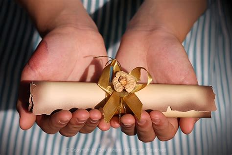 Holding Scroll In Two Hand Photography Sam Mugrabys