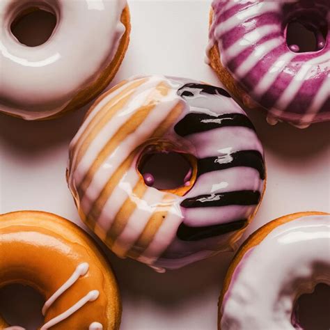 Donuts With Icing Premium Ai Generated Image