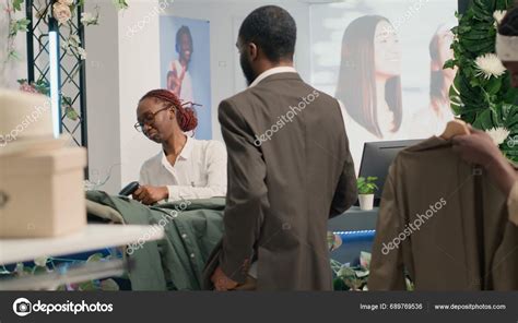 Woman Using Barcode Scanner Clothing Store Checkout Processing Customers Bought Stock Photo By