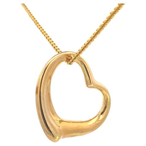 Tiffany And Co Elsa Peretti 18k Yellow Gold Open Heart Pendant