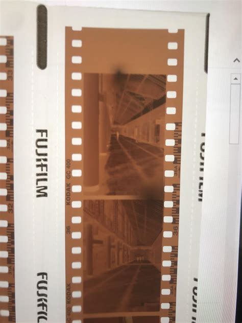 Are The Black Spots On The Edge Of These Colour Negatives A Light Leak Problem Or Developing
