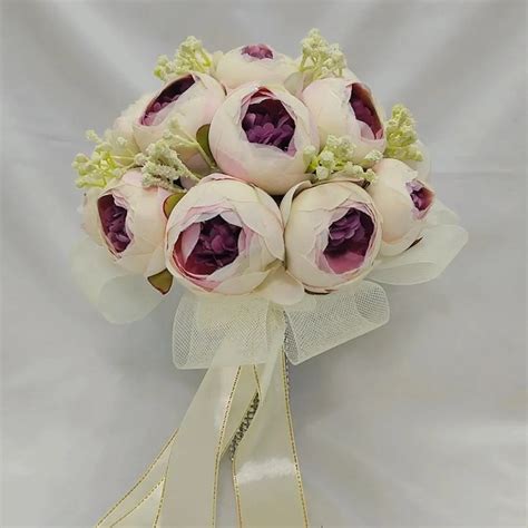 کمدا قیمت و خرید دسته گل عروس رنگ بنفش سفید سایز متوسط