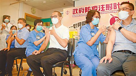一日接兩種 官員作表率 香港 香港文匯網