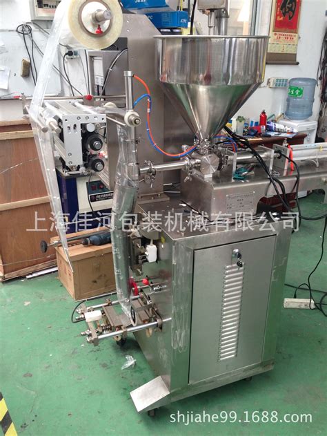 厂家供应酱料自动包装机 膏体 辣椒油 半流体自动立式包装机 阿里巴巴