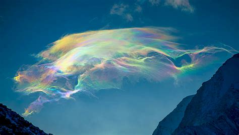 Stunning Iridescent Clouds Captured In Rare Sighting On Siberian Peak