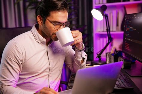 Smart It Developer Drinking Coffee Cup While Working Code On Pc Screen