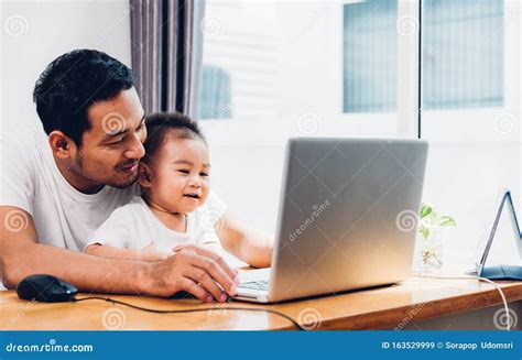 Man Father Using Working On Laptop Computer Stock Image Image Of Computer Asian 163529999