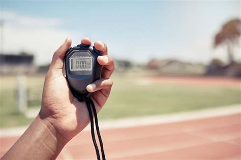Premium Photo Sport Coach And Closeup Of Hand With Stopwatch For Time