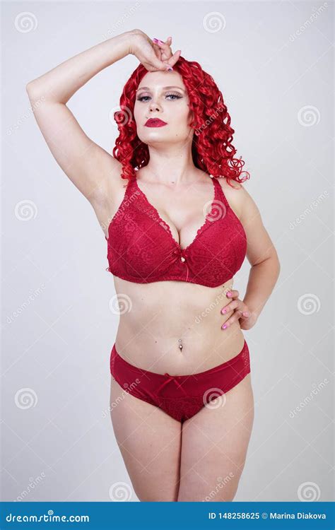 Hot Curvy Girl With Red Curly Hair Wearing Lace Lingerie And High Heels