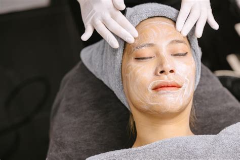 Premium Photo Woman Facial Massage Face Skin Treatment With Natural