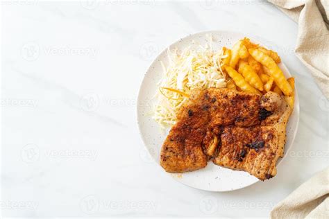 Grilled Spicy Barbecue Pork Steak With French Fries 14631369 Stock