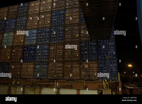Containers Stack On Ship Deck Container Loading In Cargo Freight Ship With Industrial Crane At