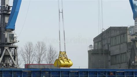 Crane Loading Cargo Containers To Container Ship In International Port Terminal Logistic