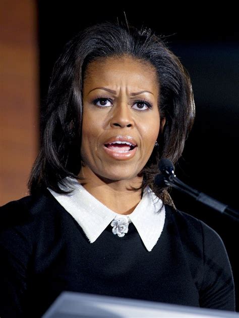 Michelle Obama And Her Hair Celebrating Eight Years Of Bangs Curls