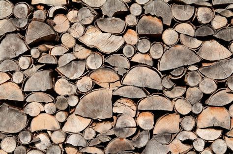 Premium Photo Stacked Logs Detail
