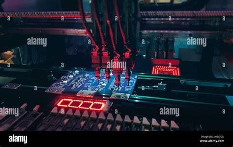 Pick And Place Robot Machine Smd Assembly Of Electronic Components On A Motherboard By An