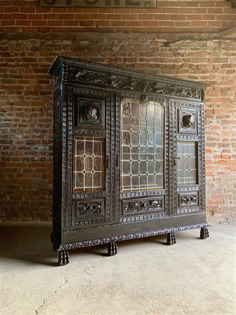 Antique Cabinet Heavily Carved Oak Victorian Circa 1880 Ebonized North