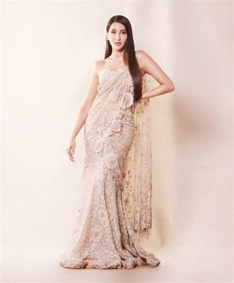 Nora Fatehi Steals The Show In Sexy Beige Embroidered Lehenga Style