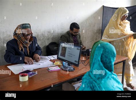 A Woman Casts Her Vote Using An Electronic Voting Machine Evm During The Dhaka City