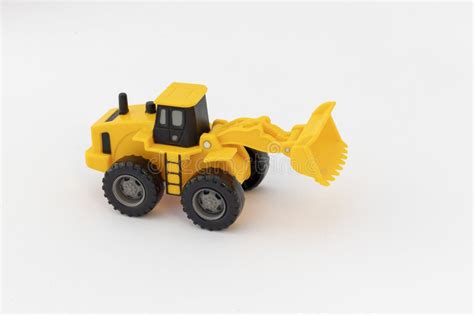 Yellow Toy Front Loader Construction Vehicle On White Background Stock Image Image Of Machine