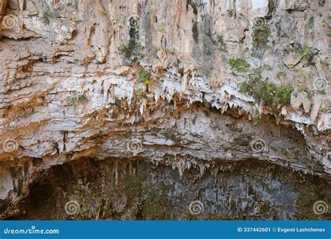 Steep Cliff With Vegetation And Overhang Stock Image Image Of