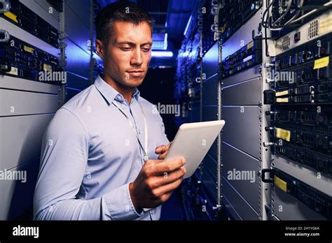Focused Data Center System Administrator Verifying Information Stock