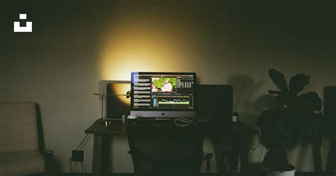 A Computer Monitor Sitting On Top Of A Desk Photo Free Human Image On Unsplash