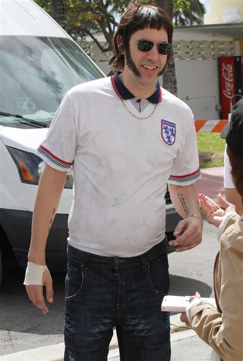 Watch Sacha Baron Cohen Shock Dwayne Johnson And Zac Efron With Graphic Sex Clip After