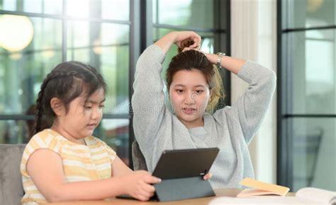 Asian Girls Study With A Tutor Private Lessons At Home Sisters And