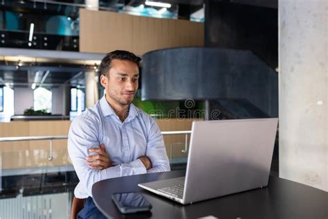 Working On Laptop Businessman In Modern Office Focusing On Screen Copy Space Stock Image