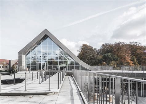 Concave Roof Links Two Parts Of A Copenhagen Cultural Centre