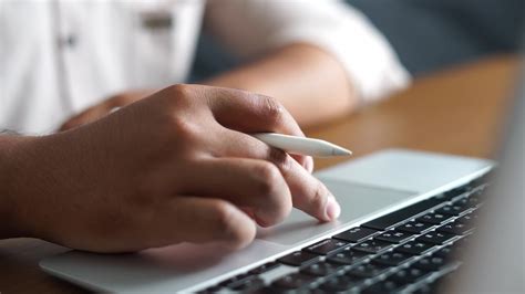 Hand Holding Digital Pencil While Scrolling Touch Pad 18756183 Stock Video At Vecteezy