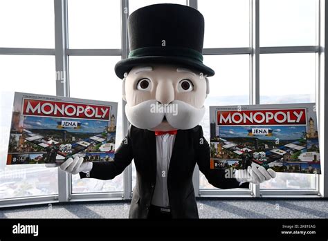 Mr Monopoly Man Holding Money