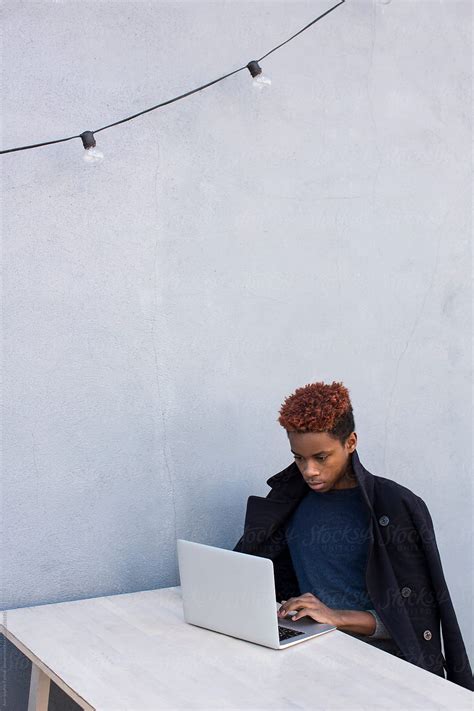 Babe Black Man On A Laptop Del Colaborador De Stocksy Bowery Image Group Inc Stocksy