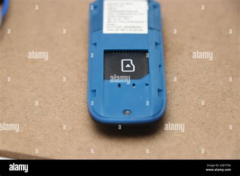 Usb Dongle With Sim Card Icon In The Wood Background Wifi Dongle With Visible Sim Card Port