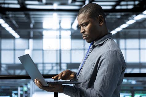 Man In Data Center Adjusting Cooling And Power Settings Stock Image Image Of Monitoring