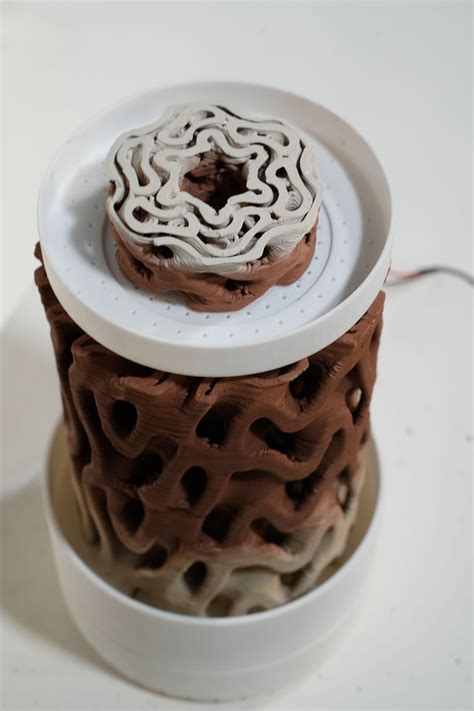 3d Printed Ceramic Cooling Tower Takes Inspiration From Termite Mounds Yanko Design