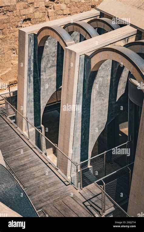 Modern Concrete Architectural Structure Featuring Arched Beams And