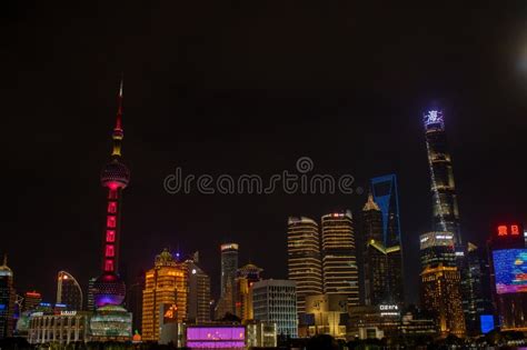 Shanghai Skyline At Night Urban District Huangpu River And Skyscrappers China Illuminated