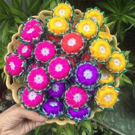 แบ่งริบบิ้นไว้ทำกุหลาบแย้มจิ๋ว เหรียญโปรยทานงานบวช พวงมาลัยริบบิ้น วนิดา คนรักชูการ์ Facebook