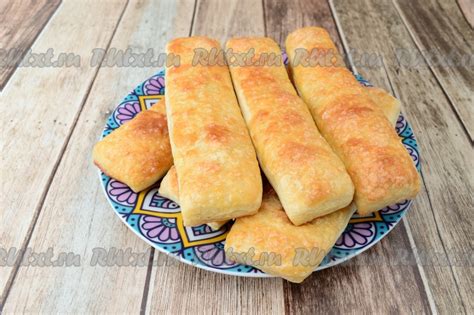 Язычки из готового слоёного дрожжевого теста с сахаром 7 фото в рецепте