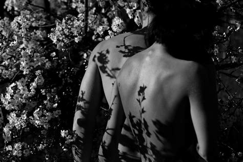 Premium Photo Sensual Couple In Cherry Bloom Naked Woman Man In Love In Blossoming Spring Tree