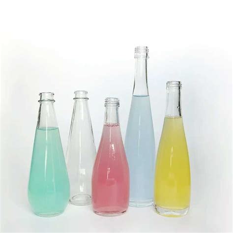 Factory Price 750ml Glass Sparkling Water Bottle With Caps Wholesale
