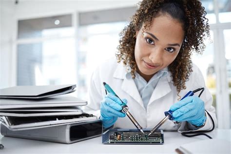Premium Photo Computer Hardware Soldering And Portrait Of Black Woman